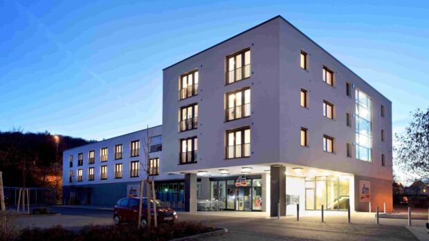 Student in Berlin Neon Wood